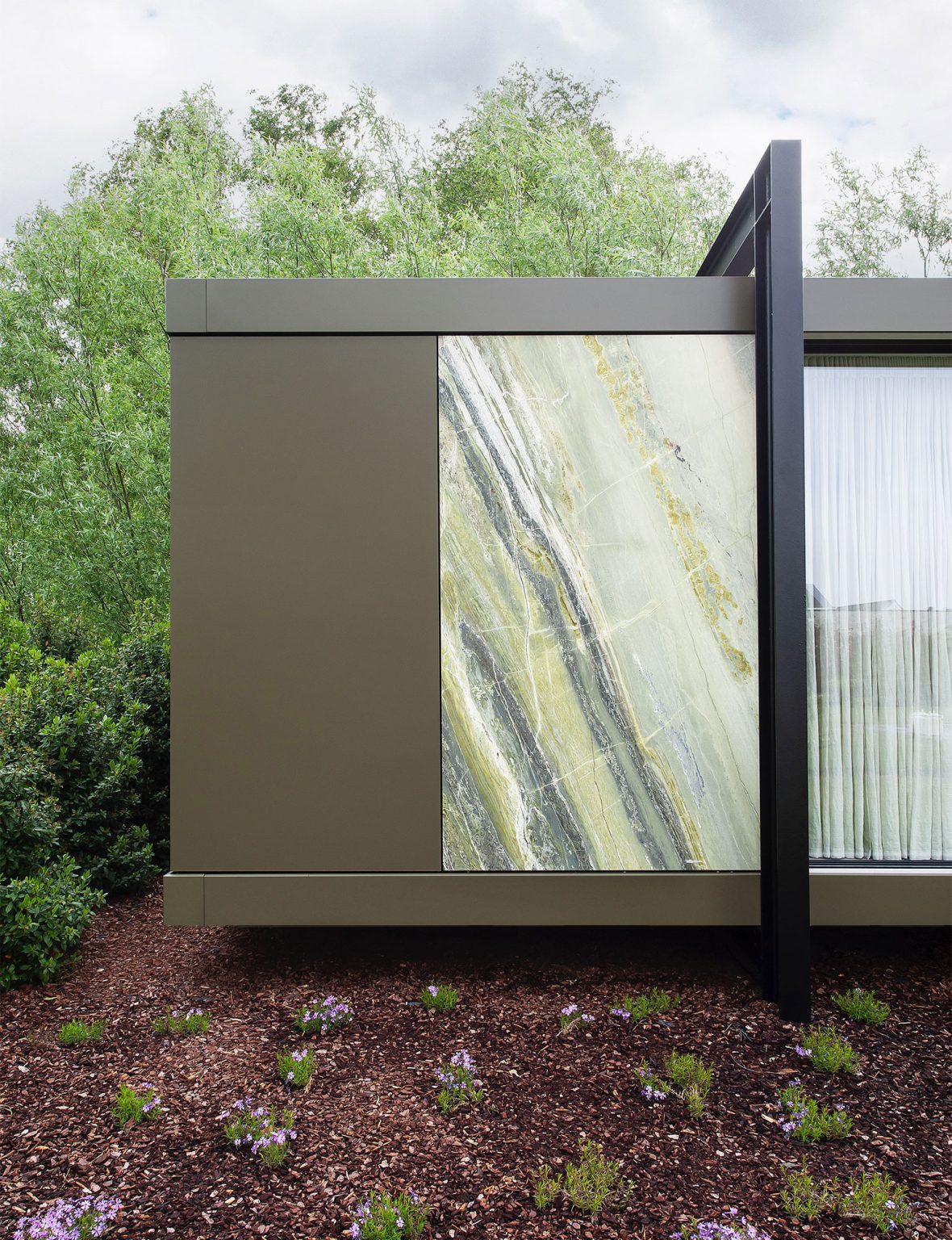 The outer covering of Irish Green Pavillion is Abet Laminati